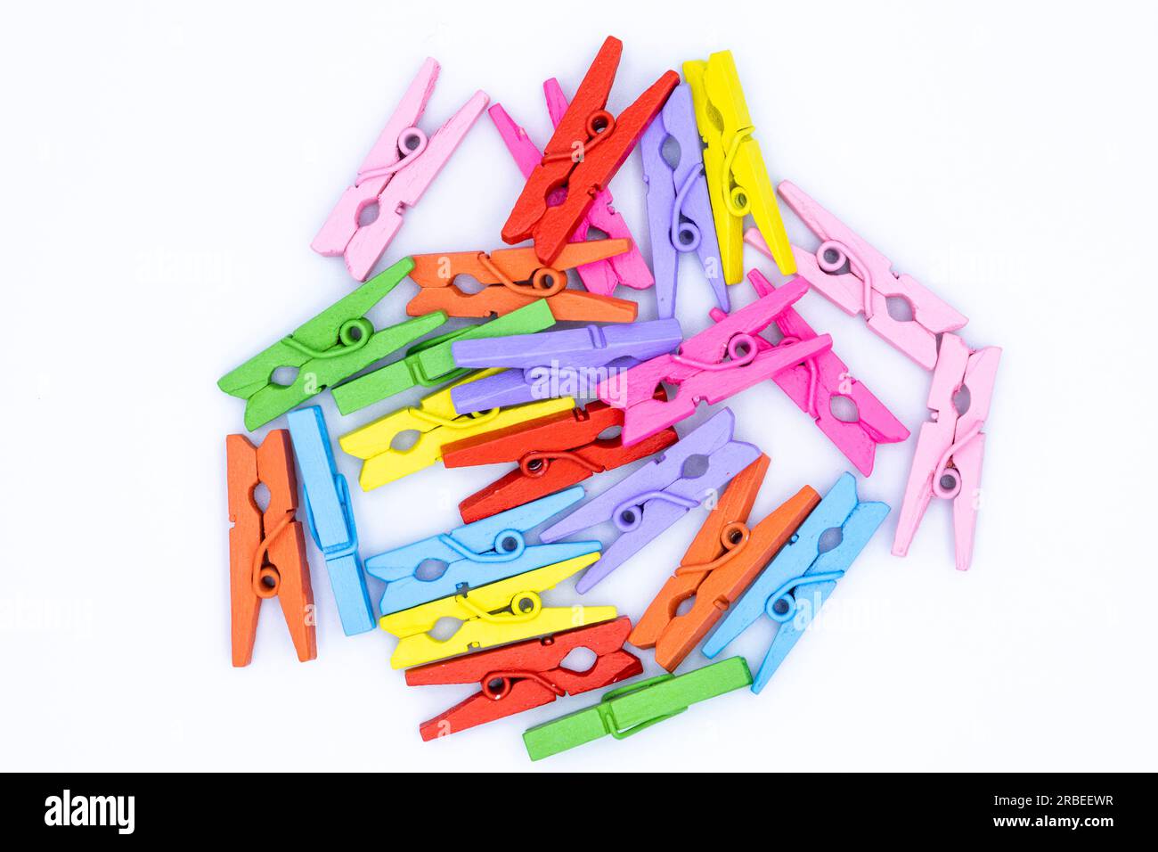 wooden clothes pins isolated on the white background Stock Photo - Alamy