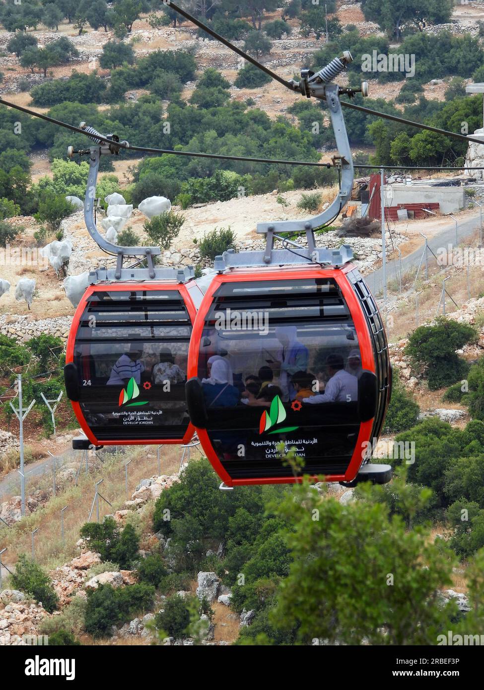 Ajloun, Jordan - A group of people enjoying inside the cable cars of ...