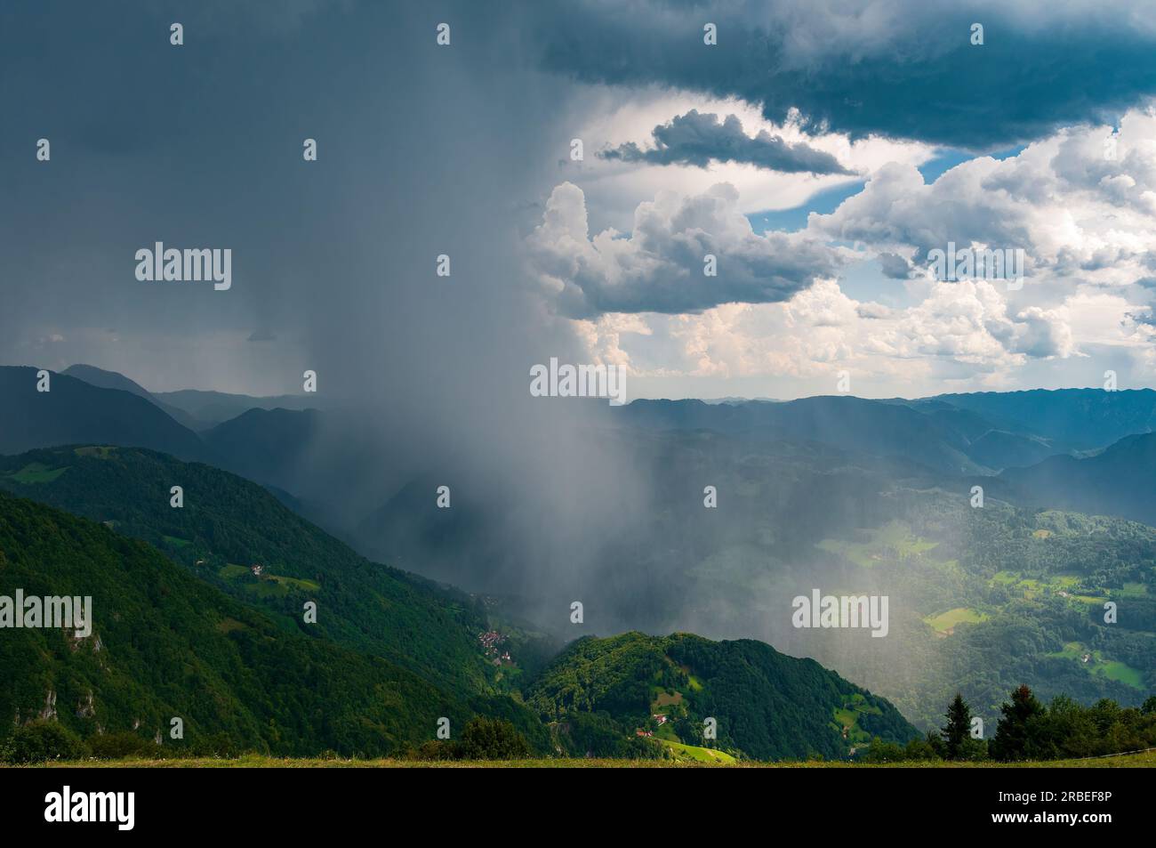 Storm rain in the mountains. Wall of falling rain in Soca valley ...