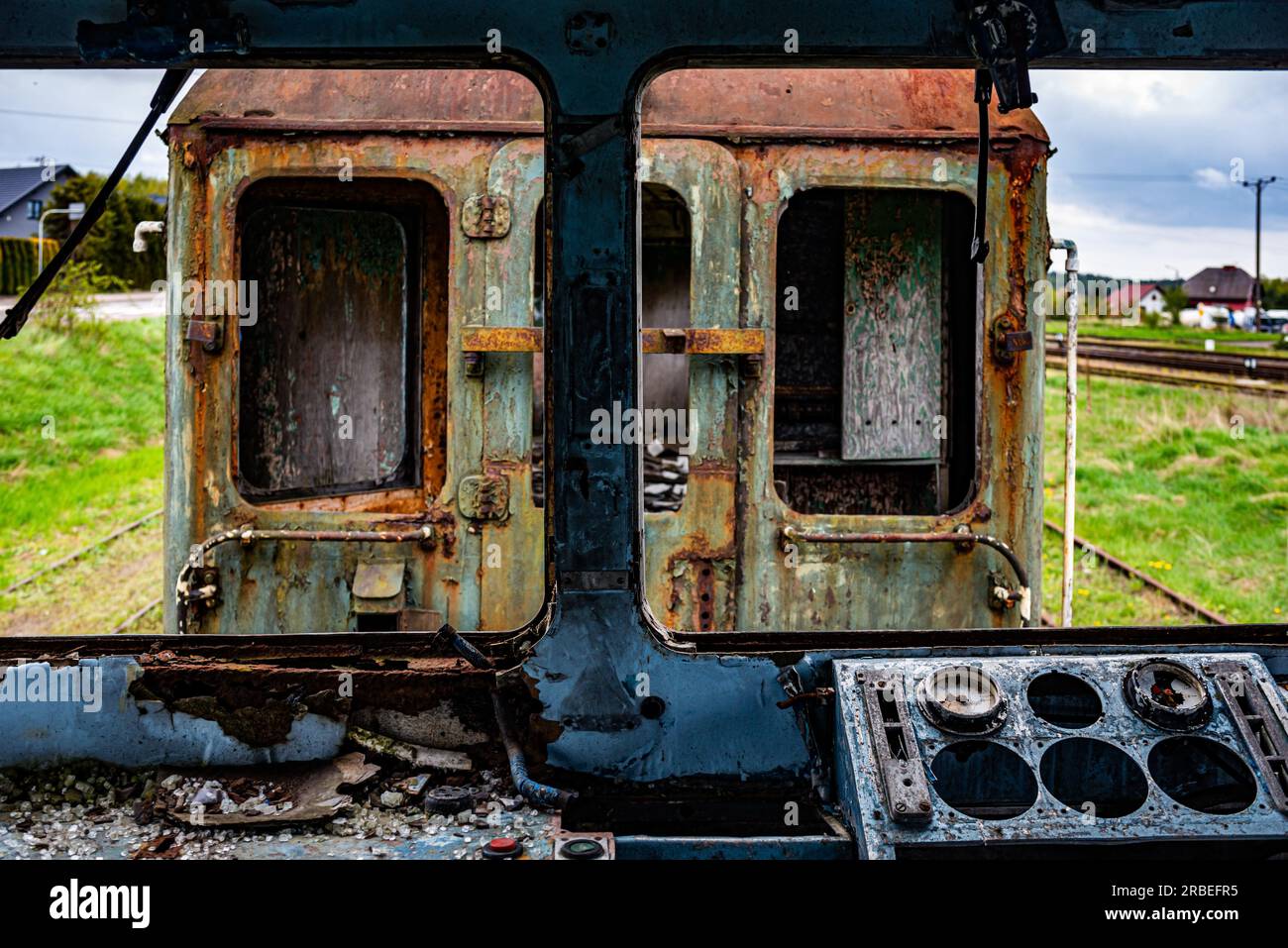 Vew from the cabin of an old damaged passenger electric train ...