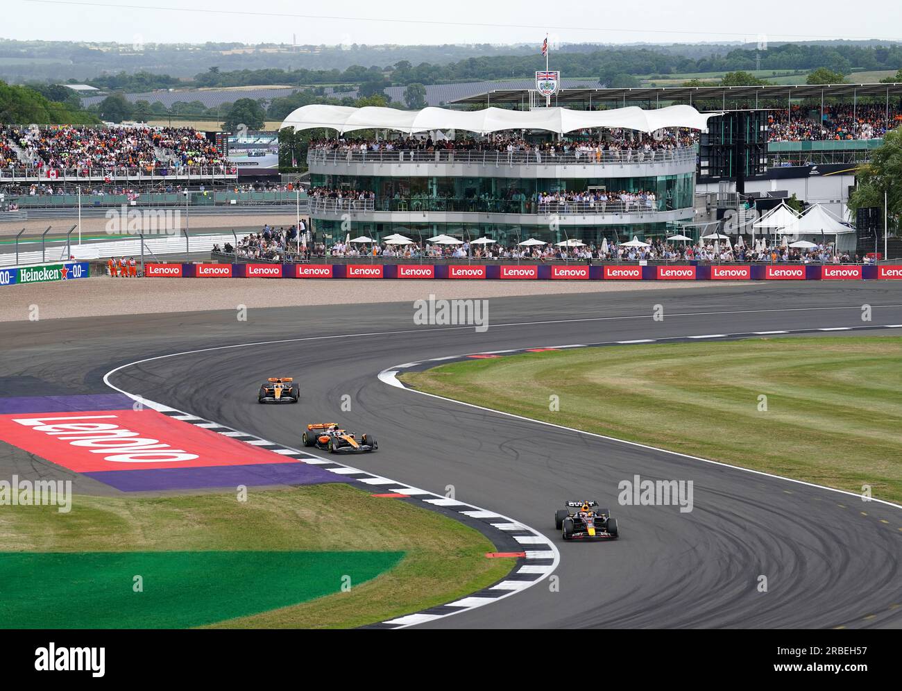 Red Bull's Max Verstappen leads from McLaren's Lando Norris through ...