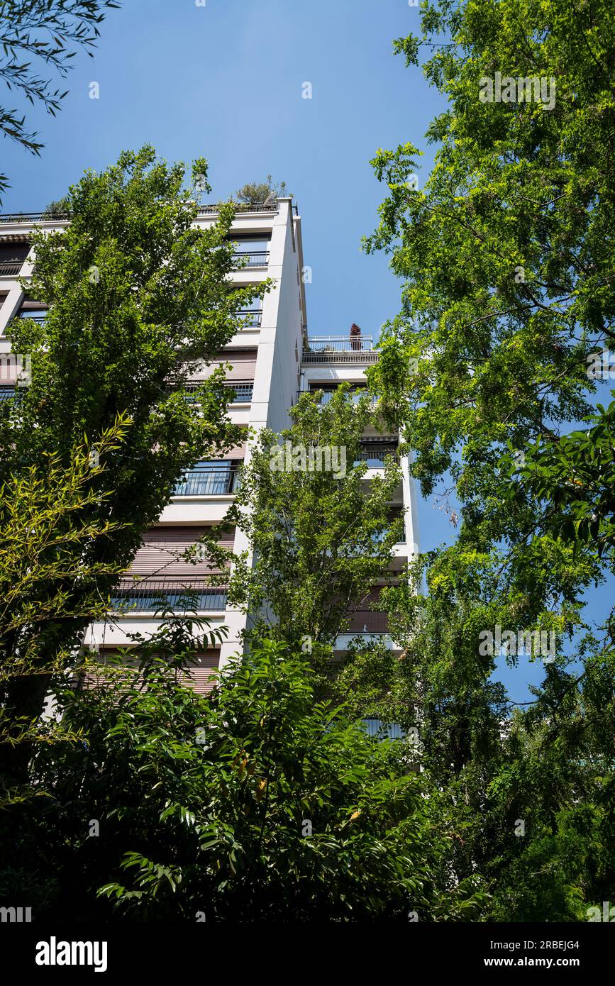 Modern apartment block surrounded with trees, Paris, France Stock Photo ...