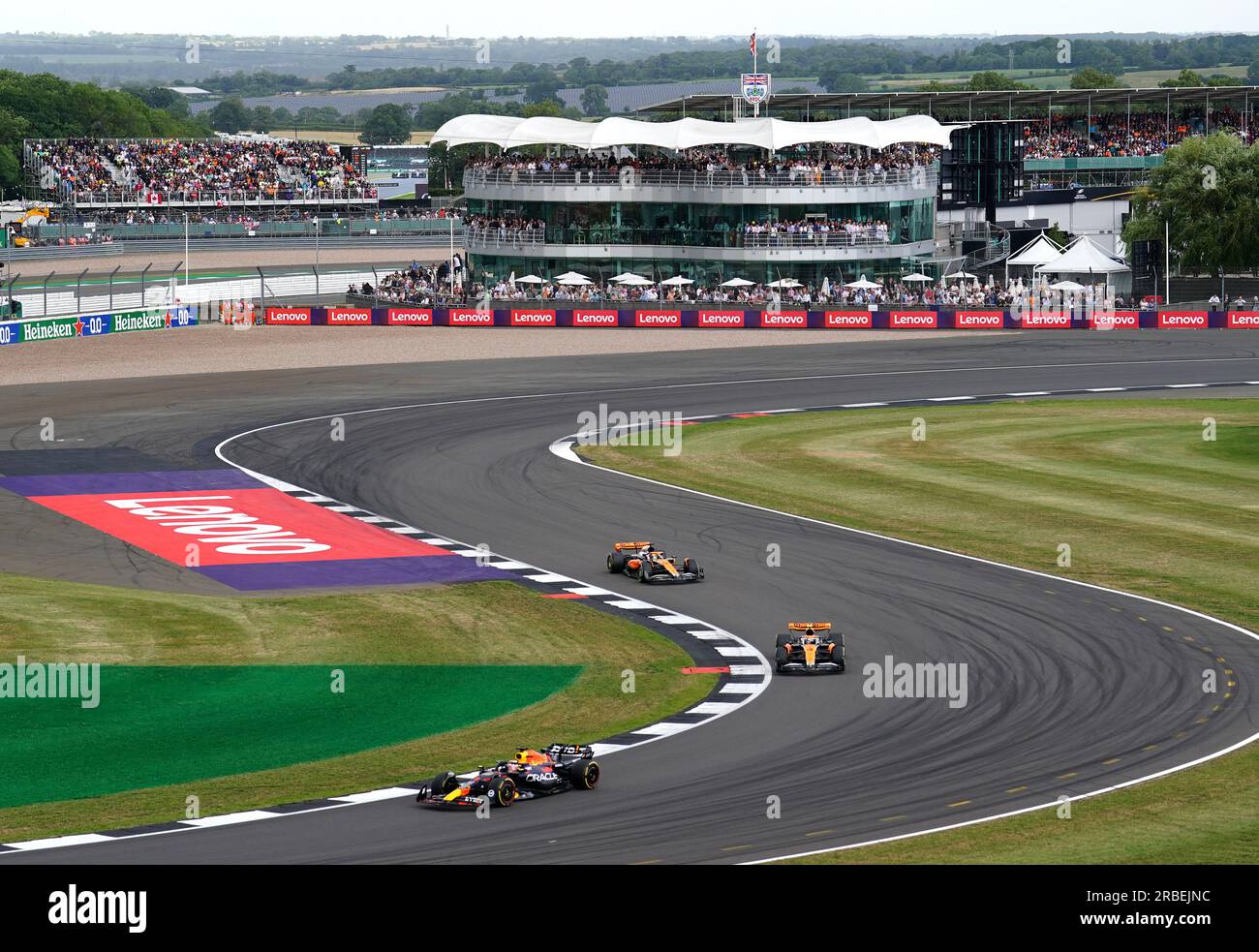 Red Bull's Max Verstappen leads from McLaren's Lando Norris around ...