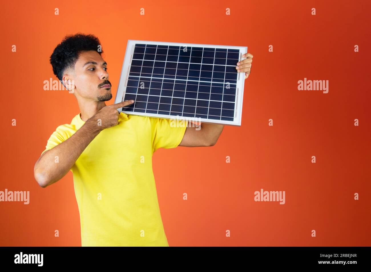 Man holding photovoltaic solar hi-res stock photography and images - Alamy
