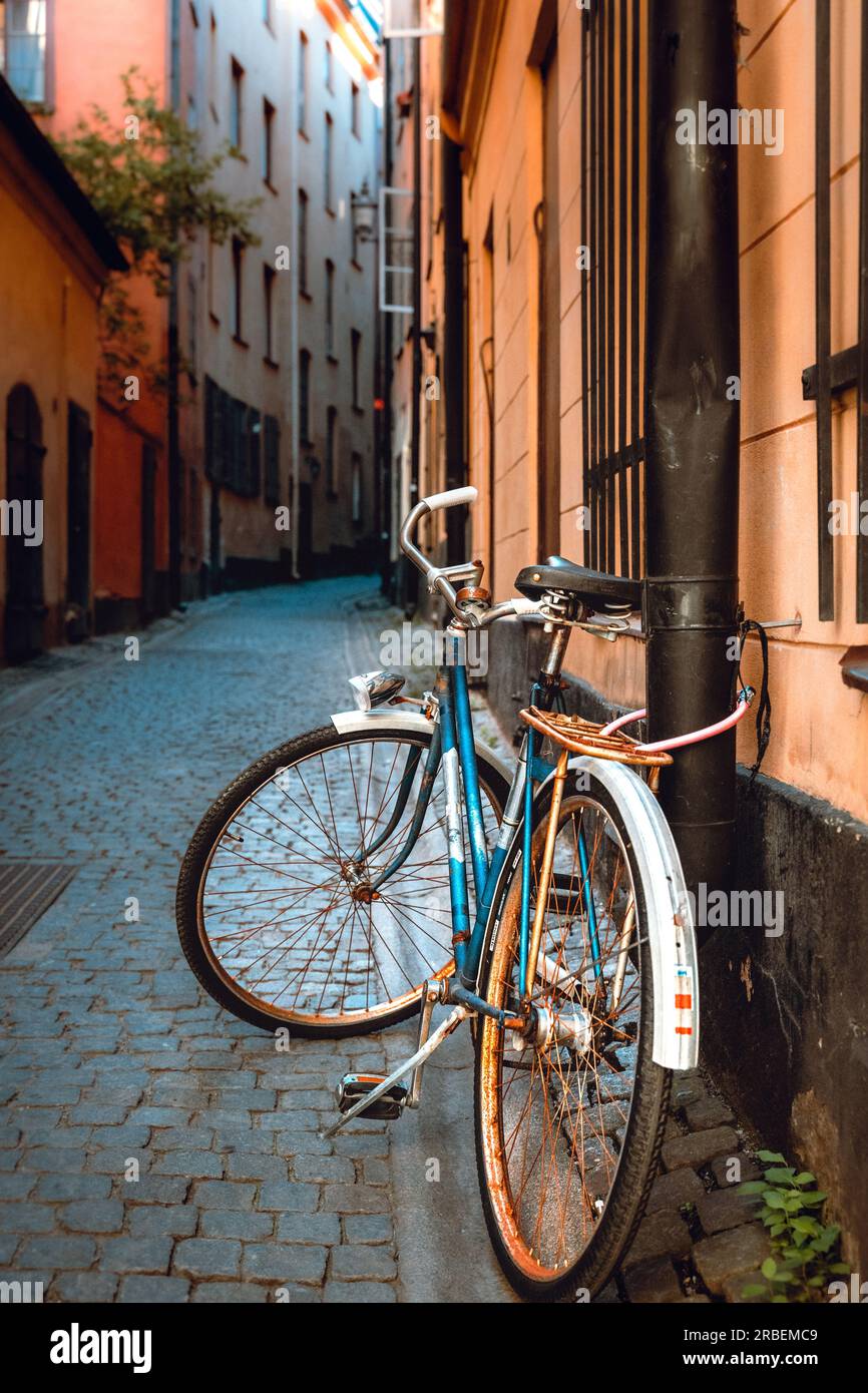 A car is tied to a rain gutter in Gamla Stan Stockholm Stock Photo - Alamy