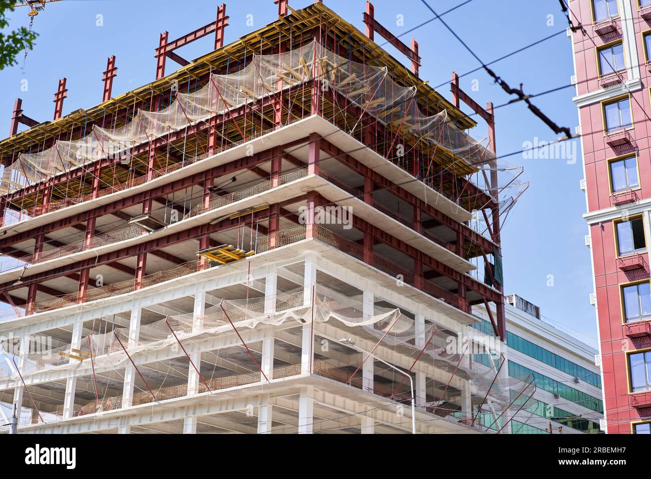 View of a large construction site with buildings under construction and ...