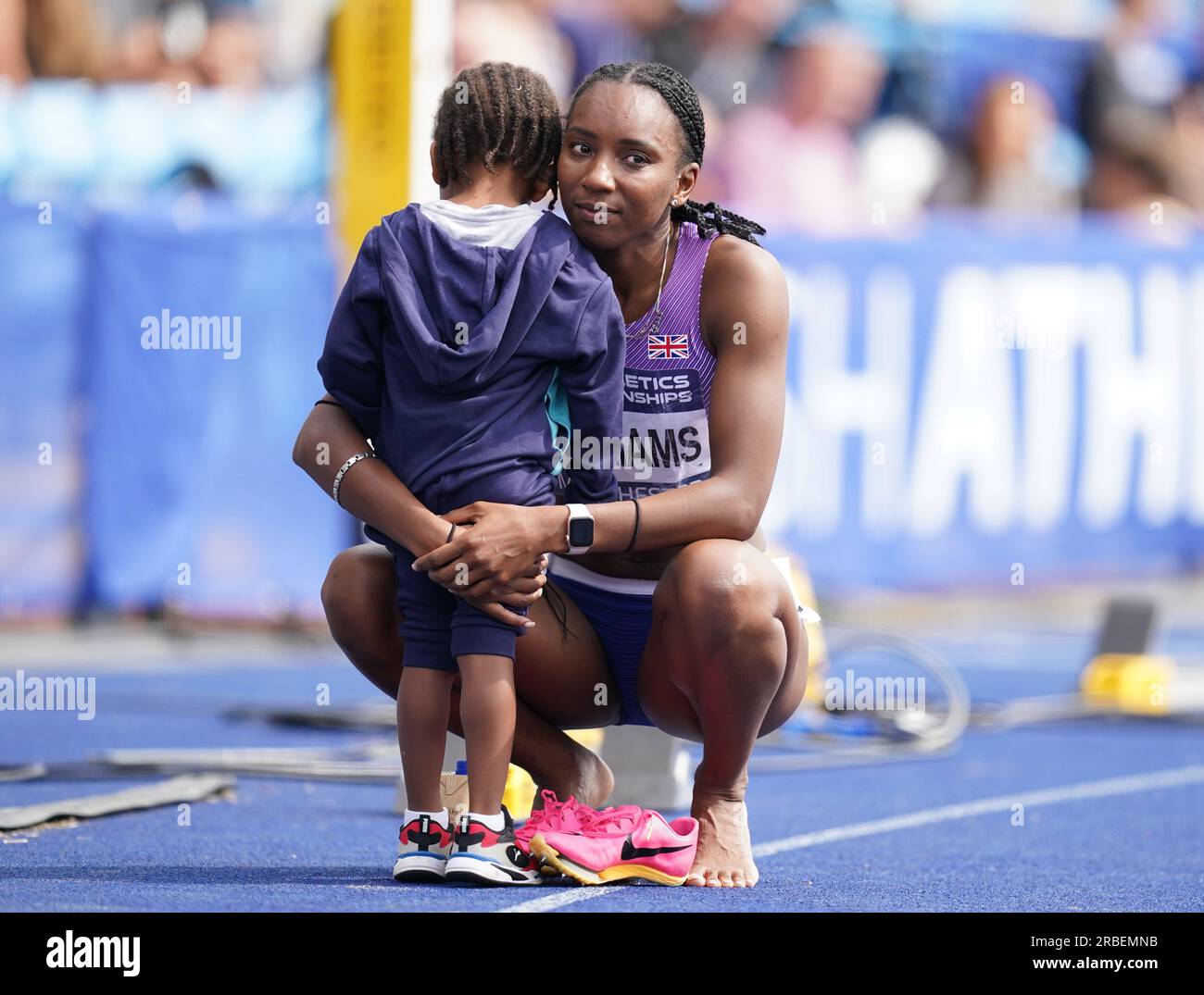 Bianca Williams, celebrates with her child after taking silver in the ...