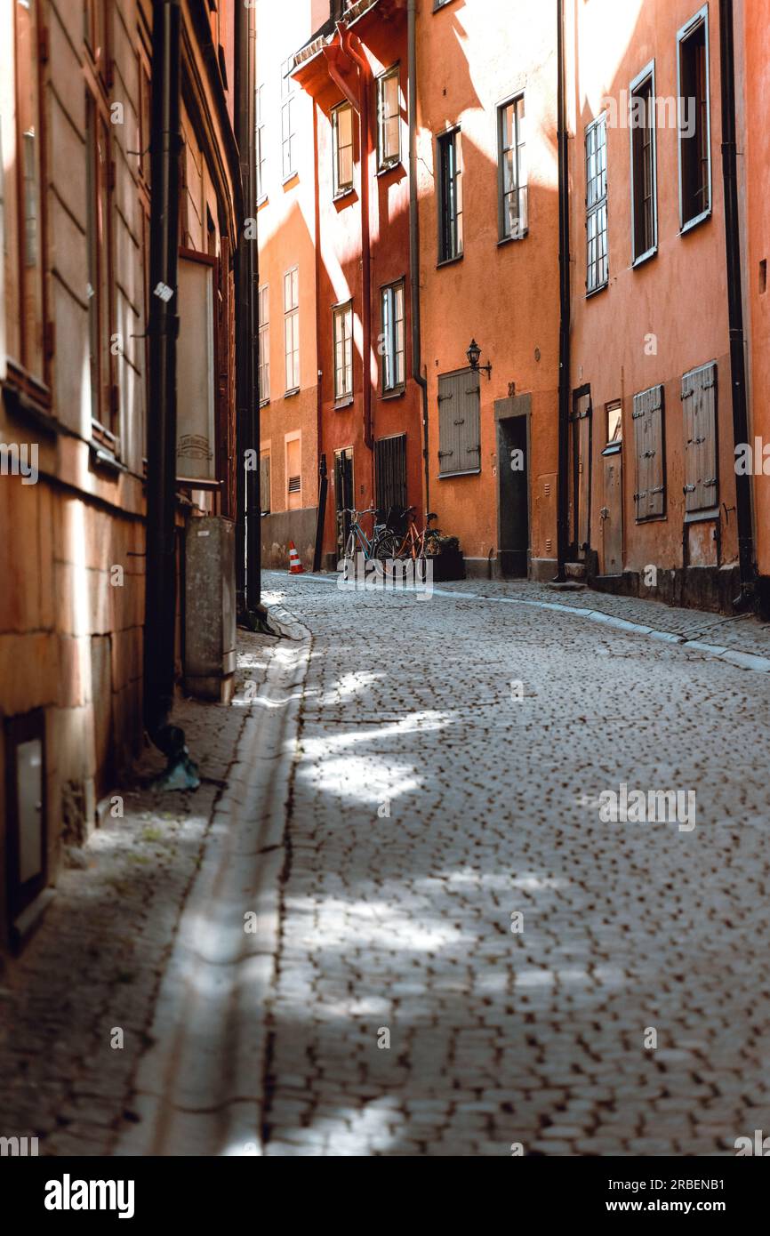 The light is hitting the colorful buildings in Gamla Stan Stock Photo ...