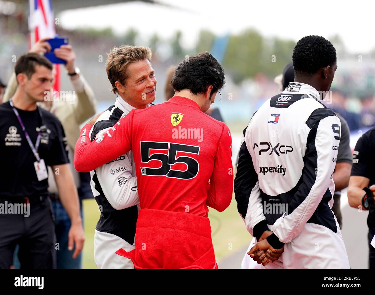 Brad Pitt hugs Ferrari's Carlos Sainz Jr whilst filming for a formula ...