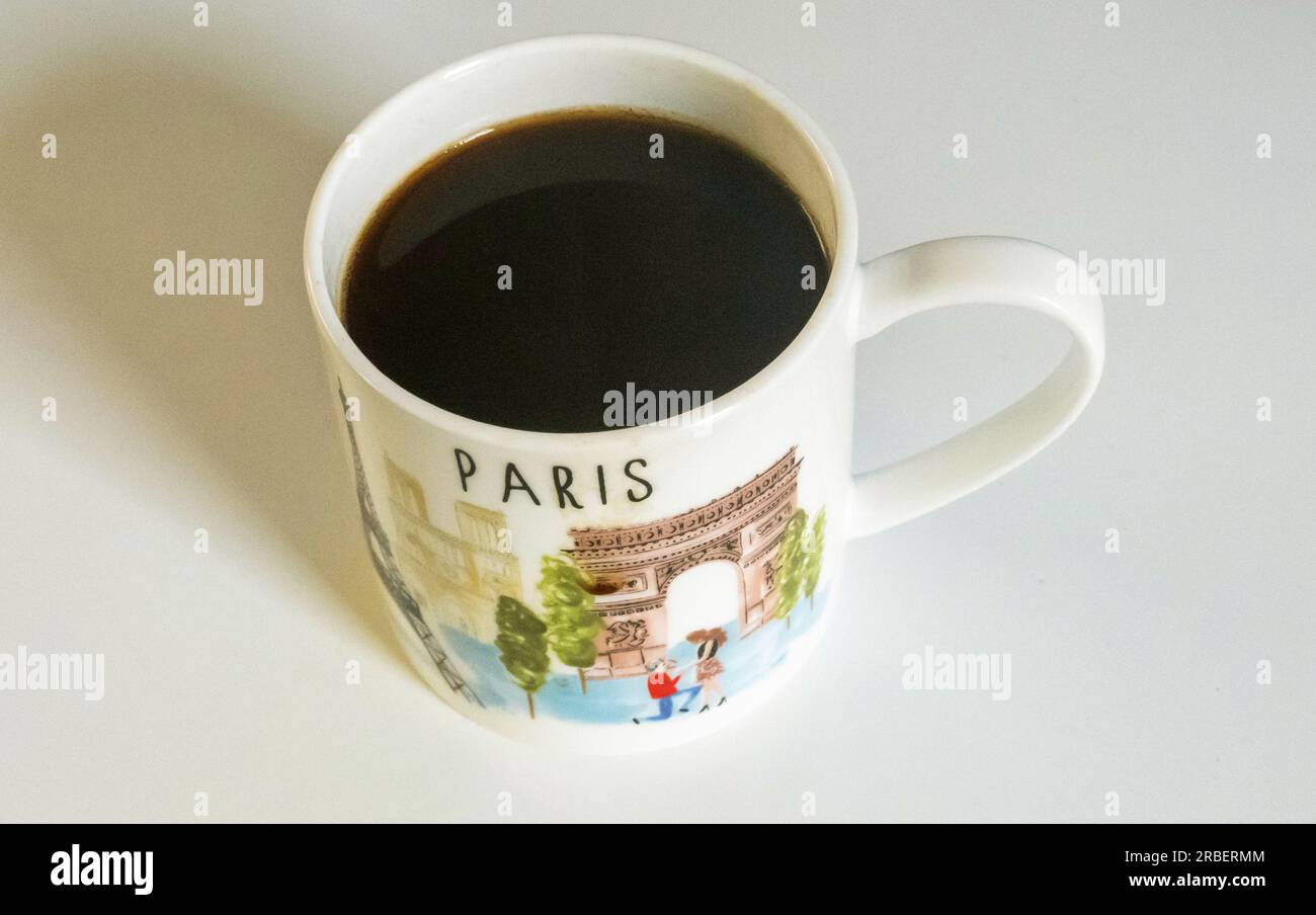 Black coffee in a Paris mug Stock Photo - Alamy