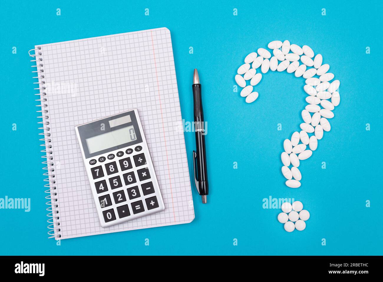 Treatment Costs and Budget. Question Mark Made from White Pills and ...