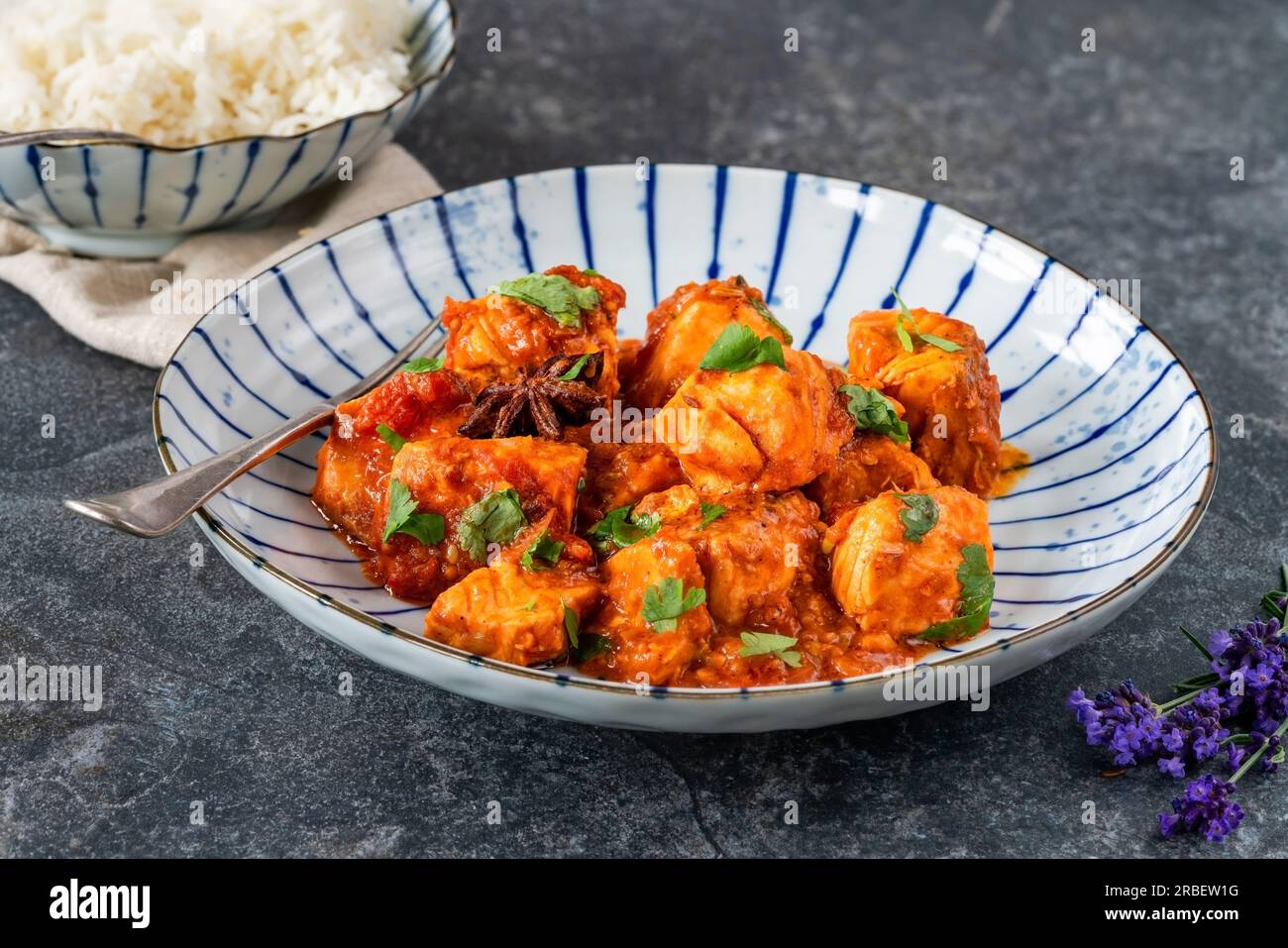 Salmon curry with basmati rice Stock Photo - Alamy