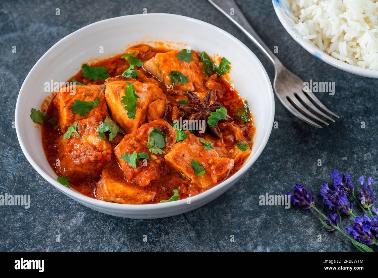 Salmon curry with basmati rice Stock Photo - Alamy