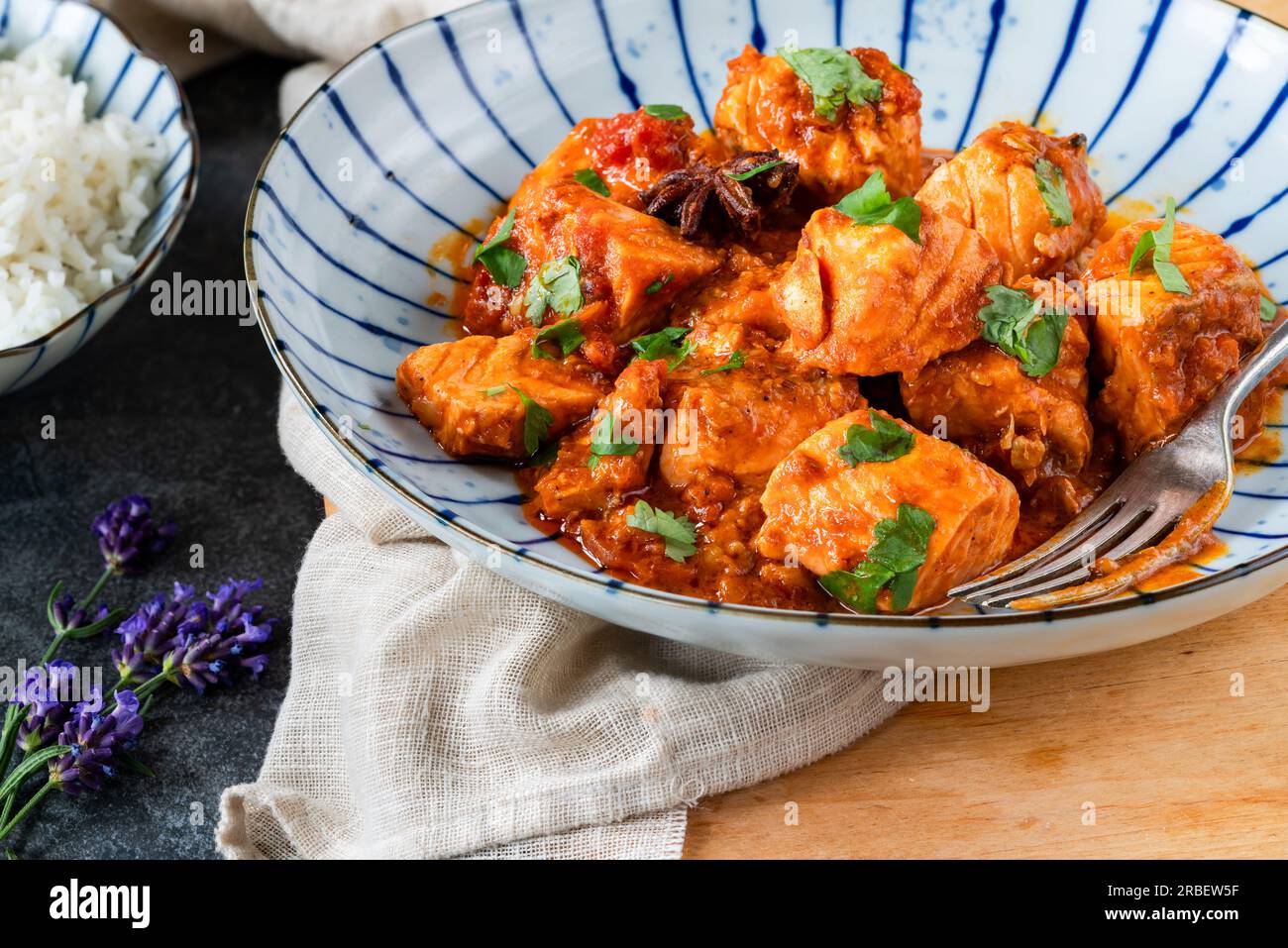 Salmon curry with basmati rice Stock Photo - Alamy