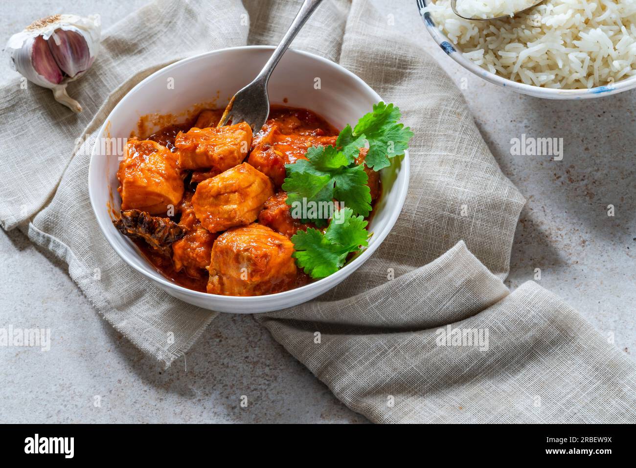 Salmon curry with basmati rice Stock Photo - Alamy