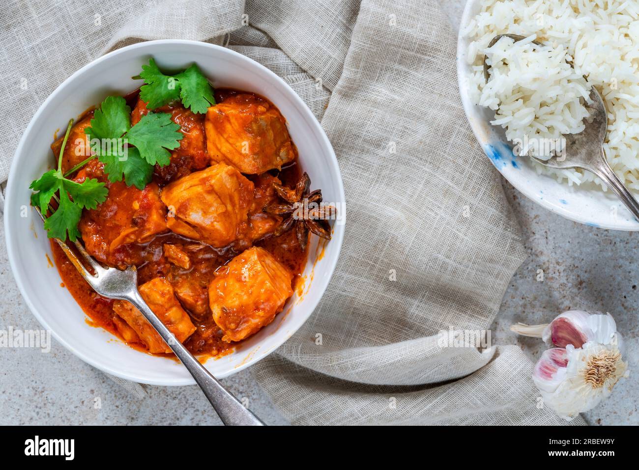 Salmon curry with basmati rice Stock Photo - Alamy