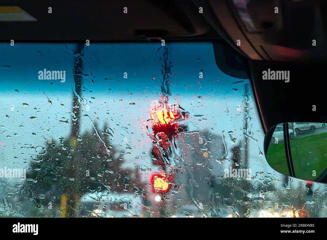 Traffic outside visible from inside the vehicle when it's raining Stock ...