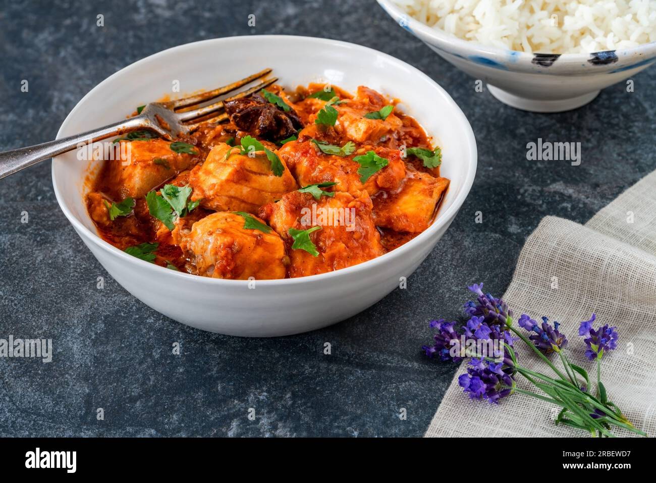 Salmon curry with basmati rice Stock Photo - Alamy