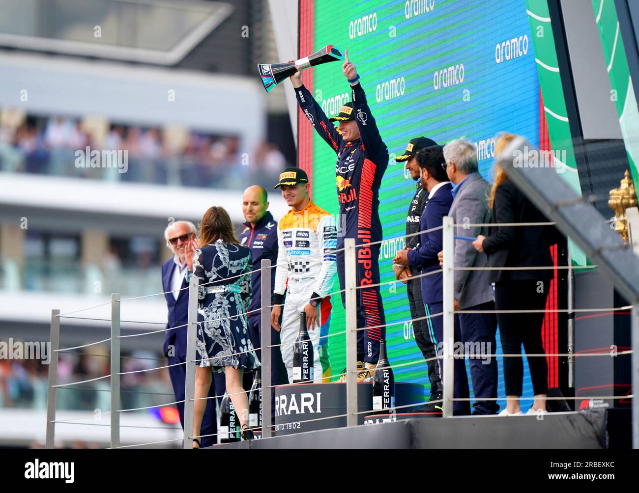 Red Bull Racing's Max Verstappen (centre) celebrates on the podium ...
