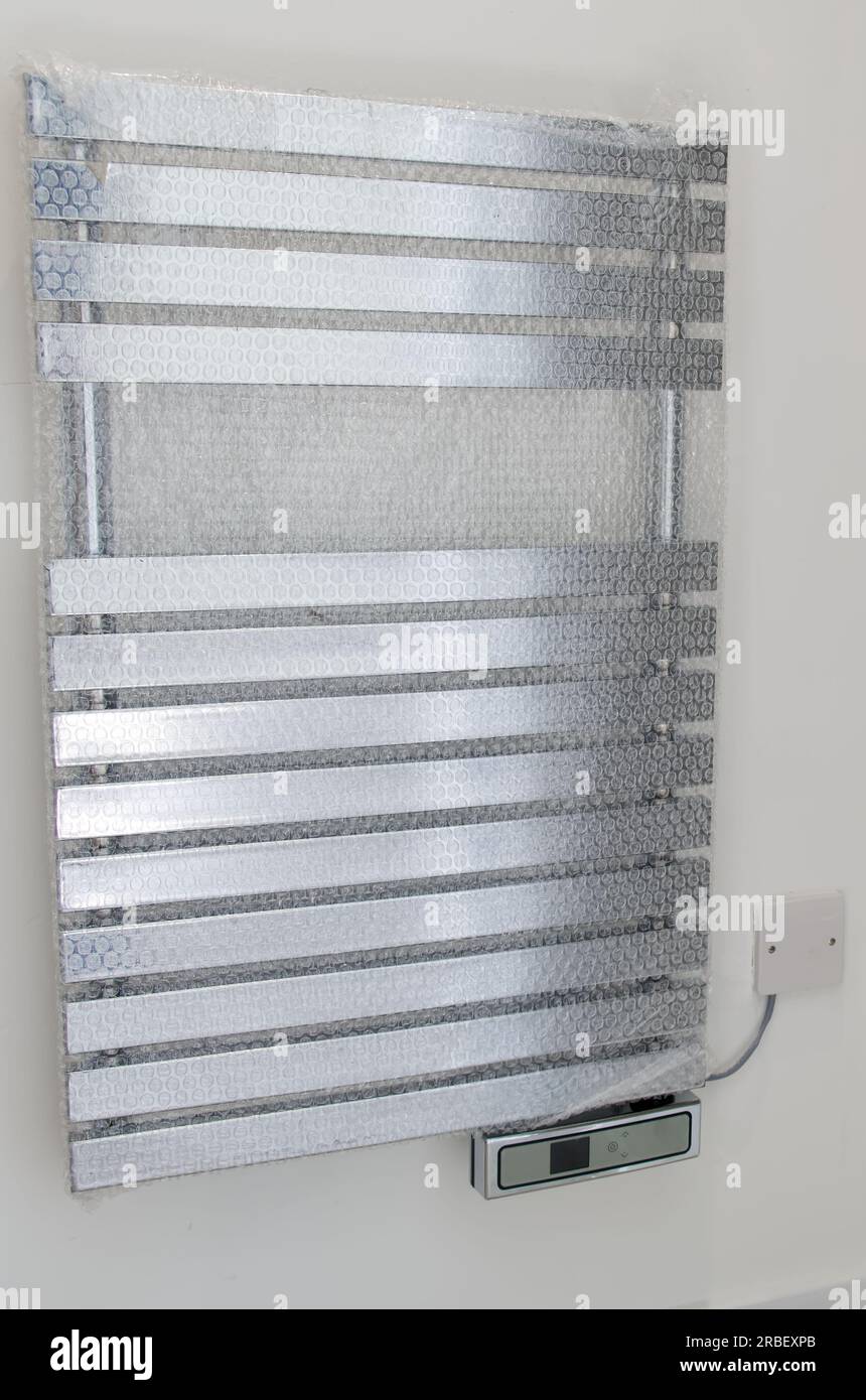 Electric rail radiator for towels fitted with a hotel with no gas Stock ...