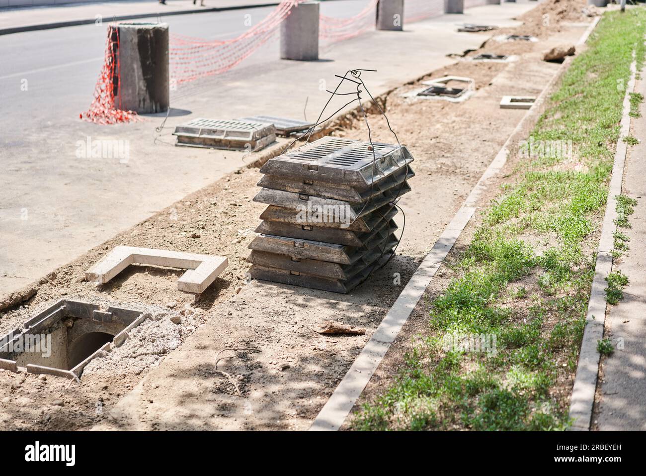 Laying concrete manholes and drain pipes for stormwater system ...