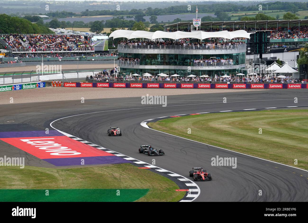 Left to right, Ferrari's Carlos Sainz Jr., Mercedes' George Russell and ...