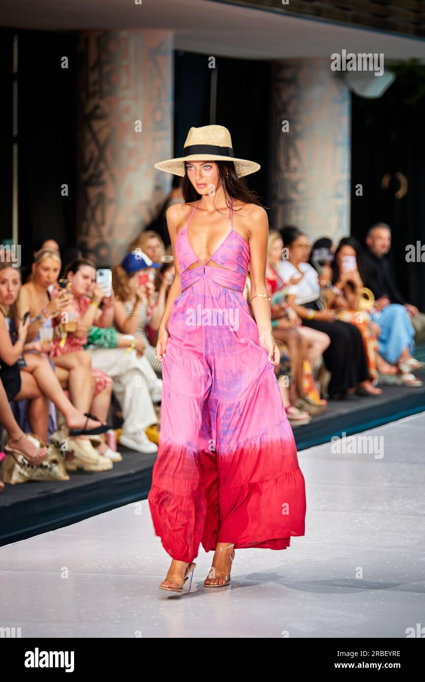 Miami Beach, USA. 09th July, 2023. MIAMI BEACH, FLORIDA - A model walks ...