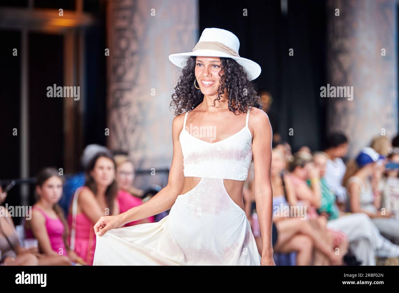 Miami Beach, USA. 09th July, 2023. MIAMI BEACH, FLORIDA - A model walks ...