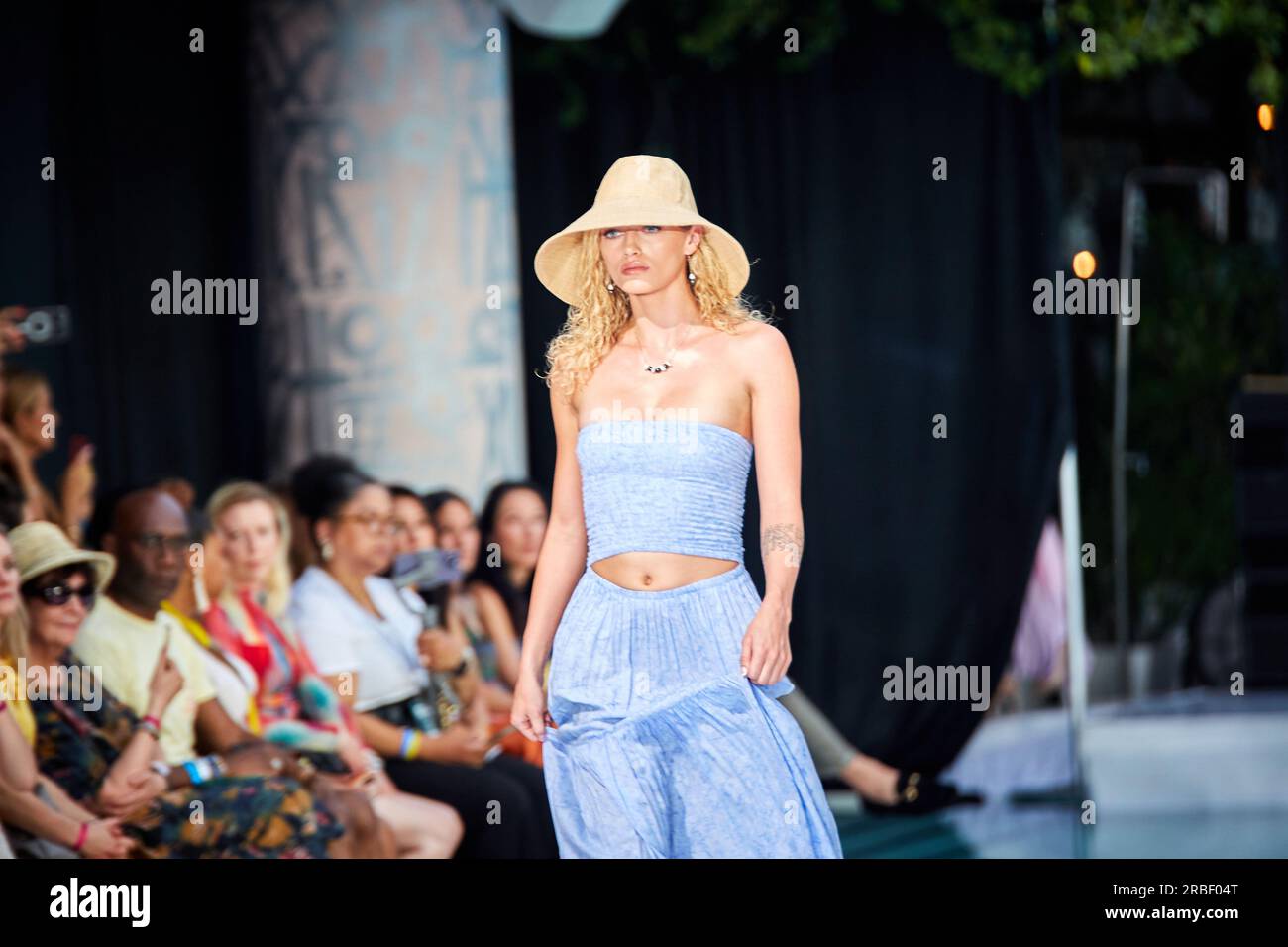 Miami Beach, USA. 09th July, 2023. MIAMI BEACH, FLORIDA - A model walks ...