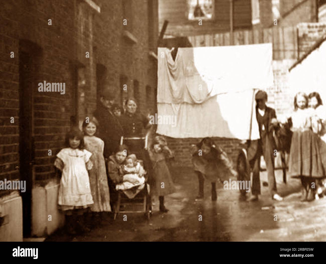 Washing day in slum housing, Victorian period Stock Photo - Alamy
