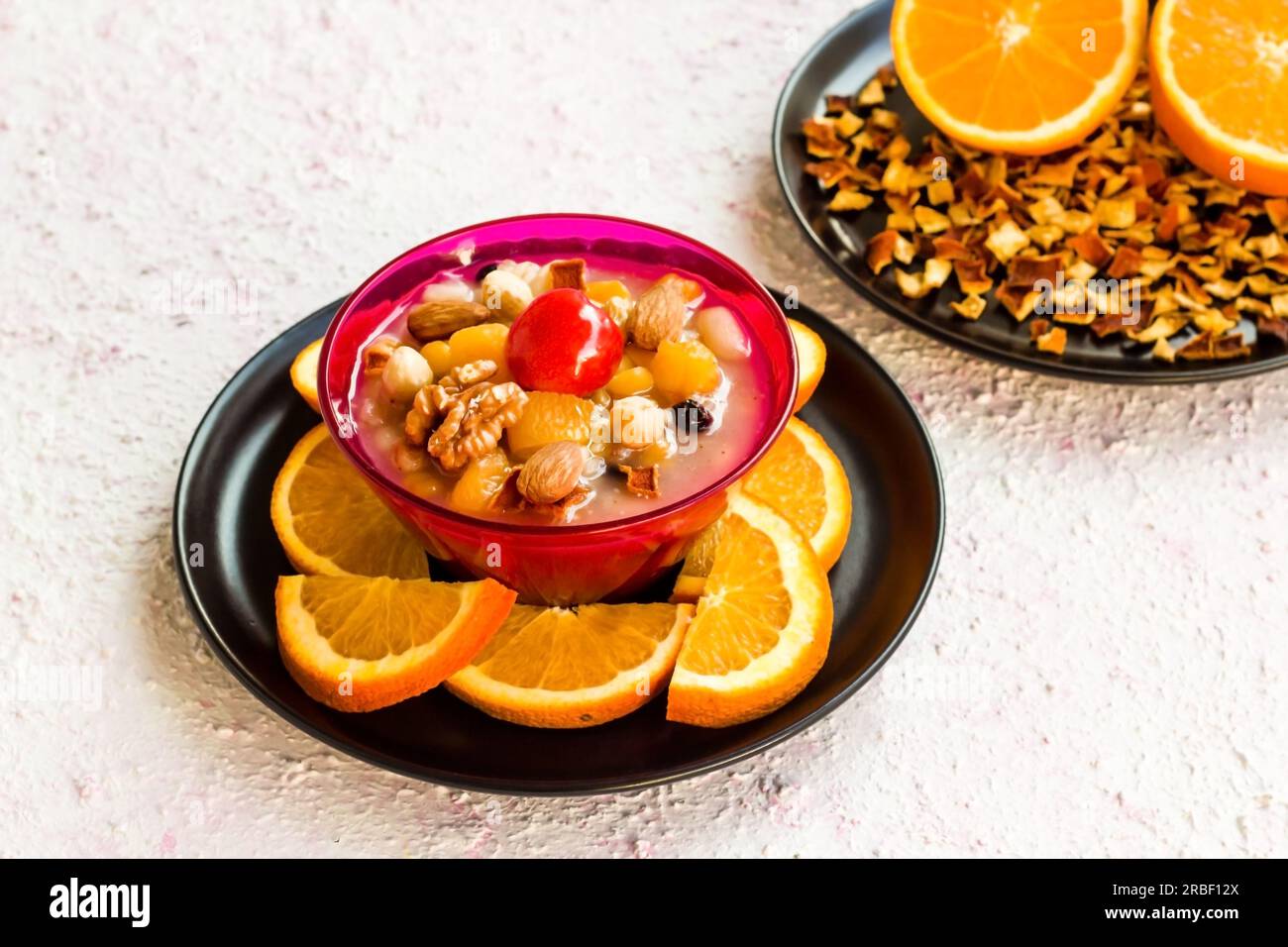 Traditional Turkish Orange Ashura Dessert, designed with sliced oranges ...