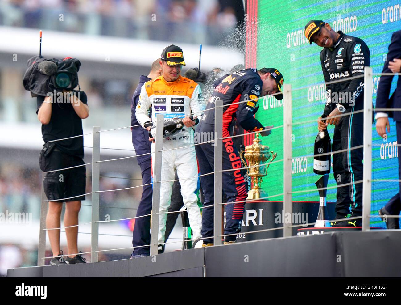 McClaren's Lando Norris, Red Bull Racing's Max Verstappen and Mercedes' Lewis Hamilton celebrate ...