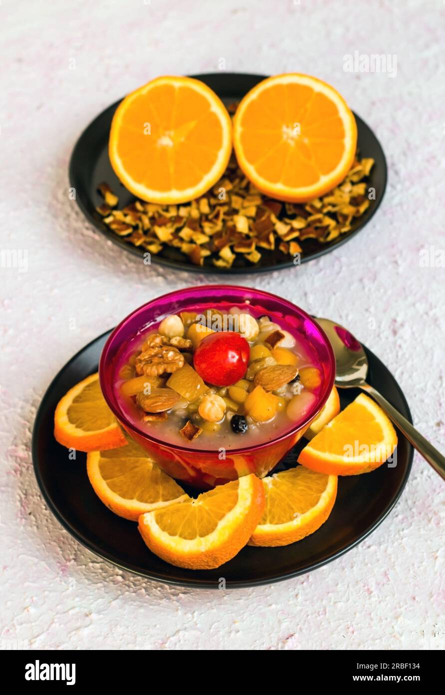 Traditional Turkish Orange Ashura Dessert, designed with sliced oranges ...