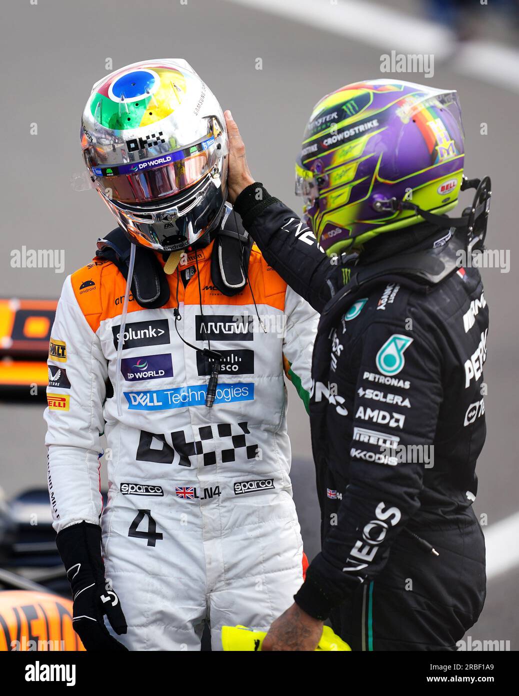 McLaren's Lando Norris (left) who finished second celebrate with ...