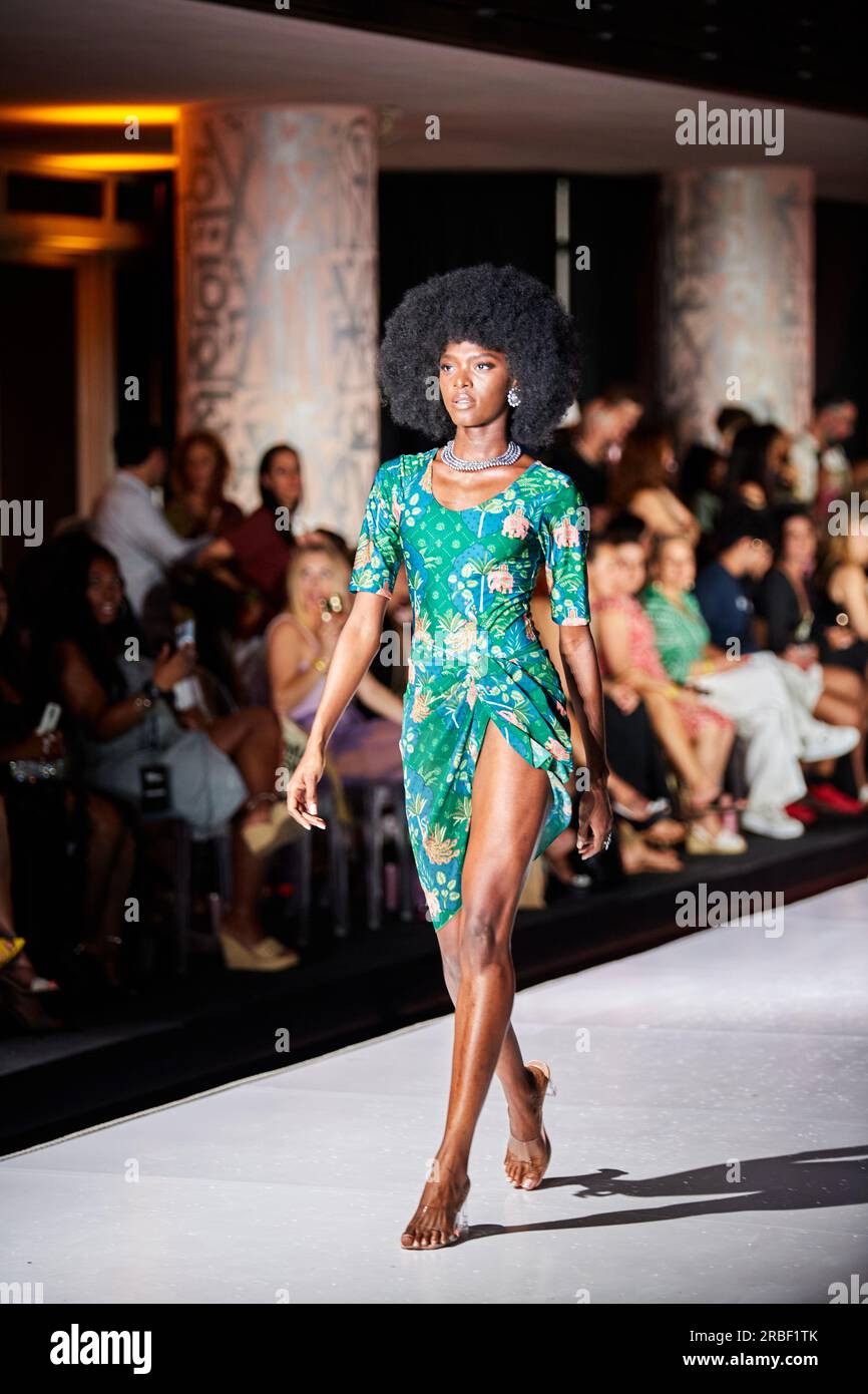 Miami Beach, USA. 09th July, 2023. MIAMI BEACH, FLORIDA - A model walks ...
