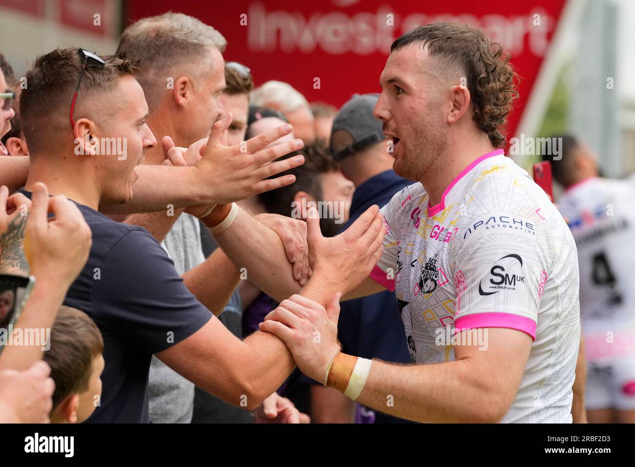 Cameron Smith #13 of Leeds Rhinos celebrates with the fans after the ...