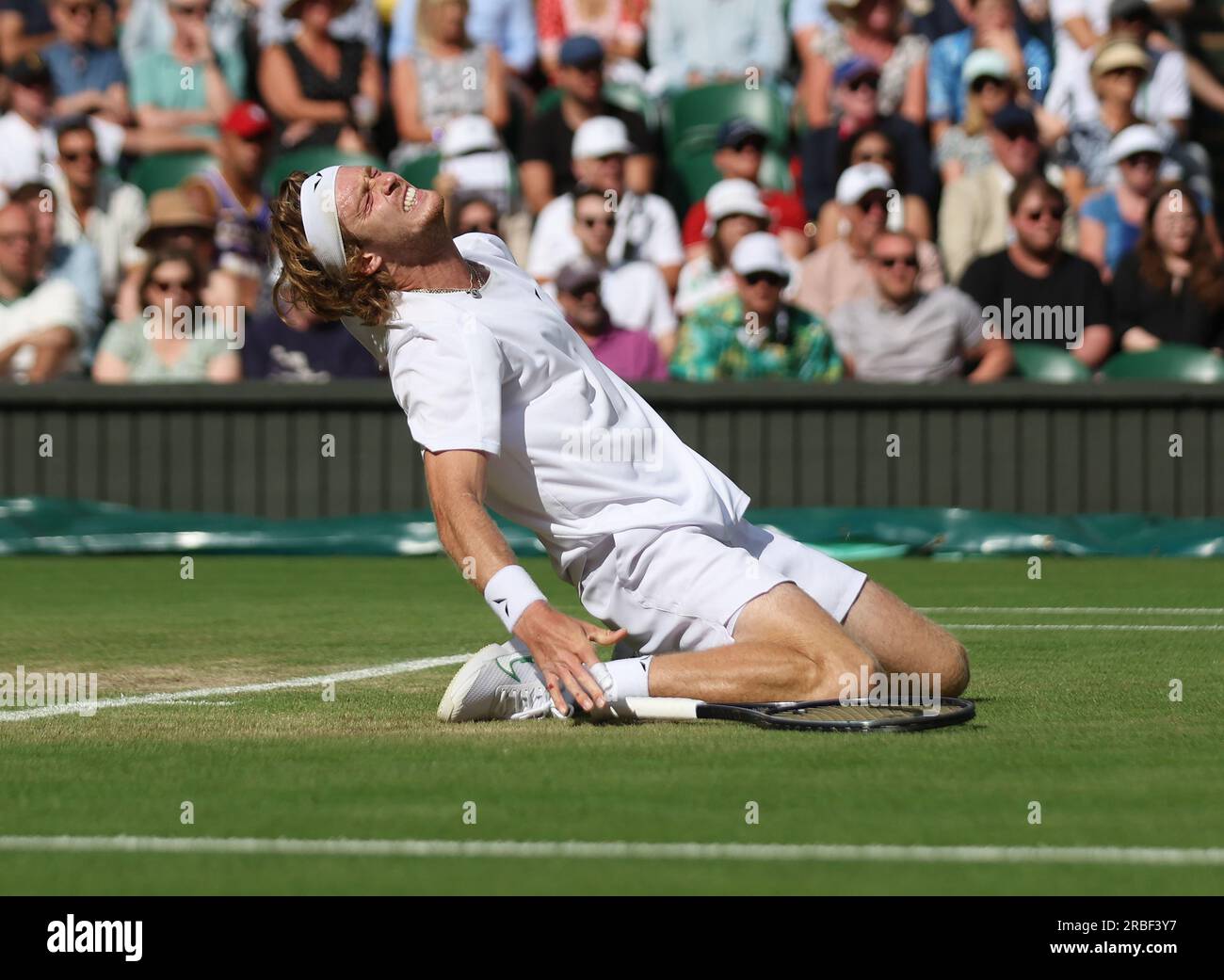 London, UK. 09th July, 2023. Russian Andrey Rublev reacts in pain in ...