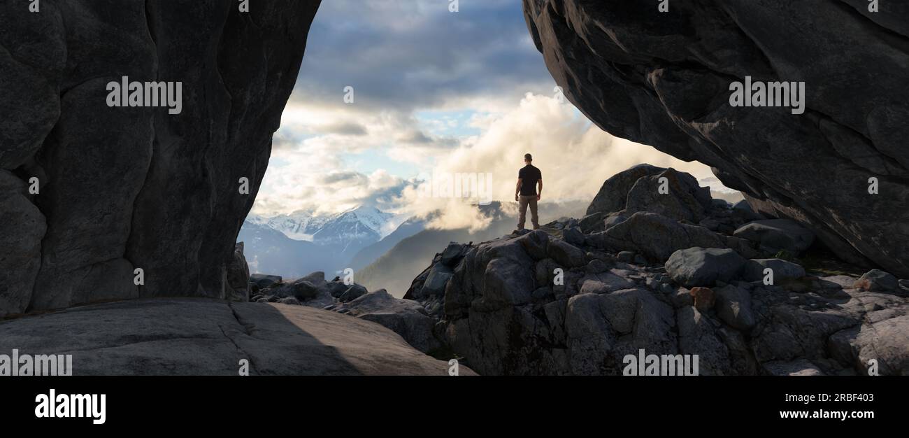 Adventurous Man Standing in cave on top of Mountain. Extreme Adventure ...