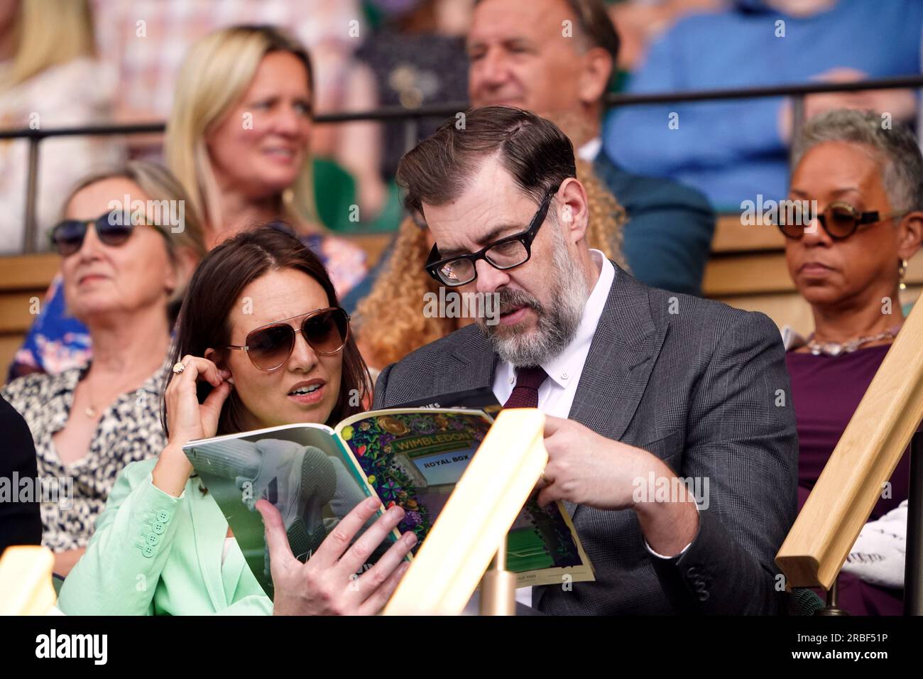 Richard Osman and Ingrid Oliver in the royal box of centre court on day ...