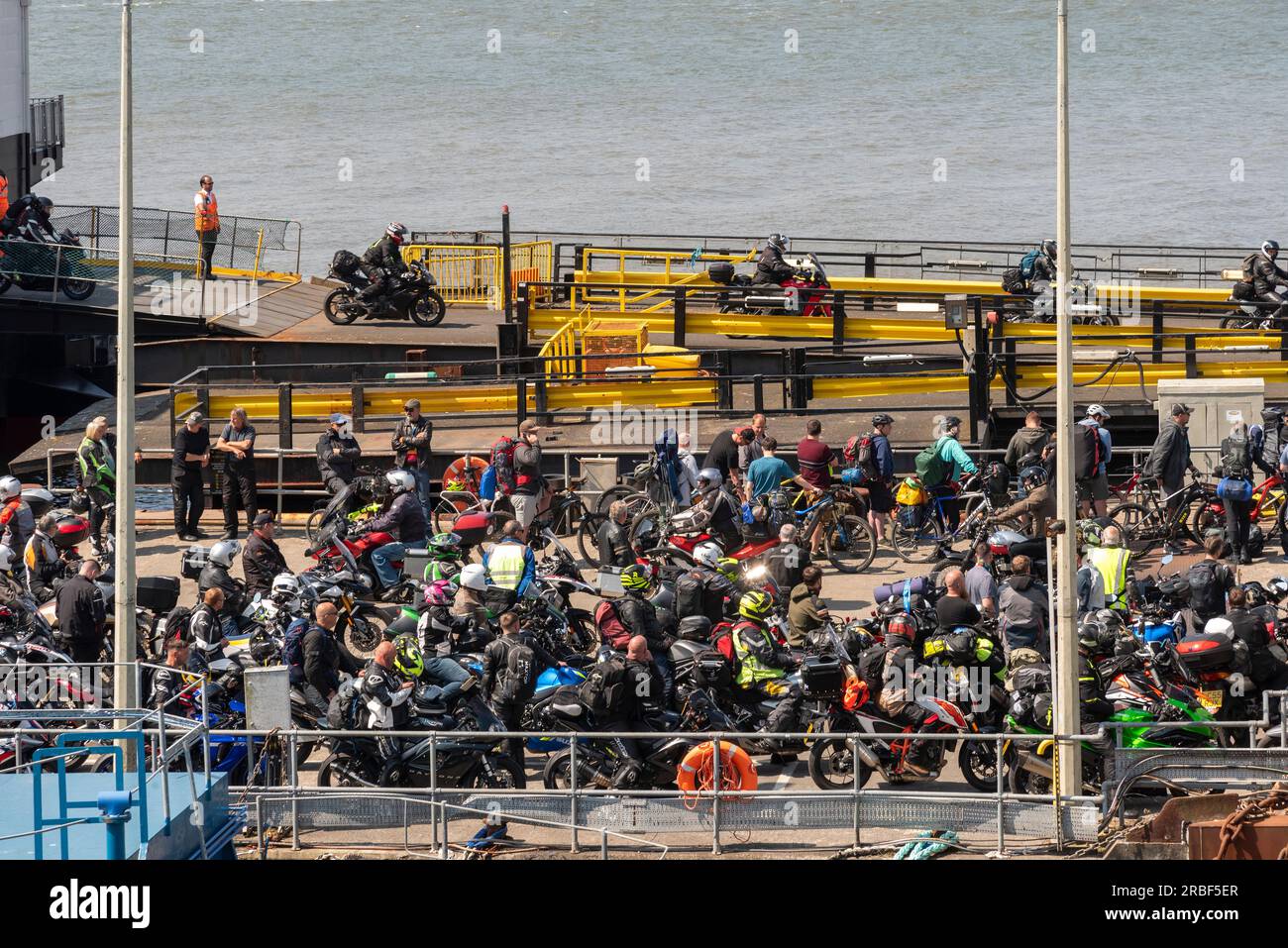 Liverpool; England; UK; 8 June 2023. Motocyclists cram on the dockside ...