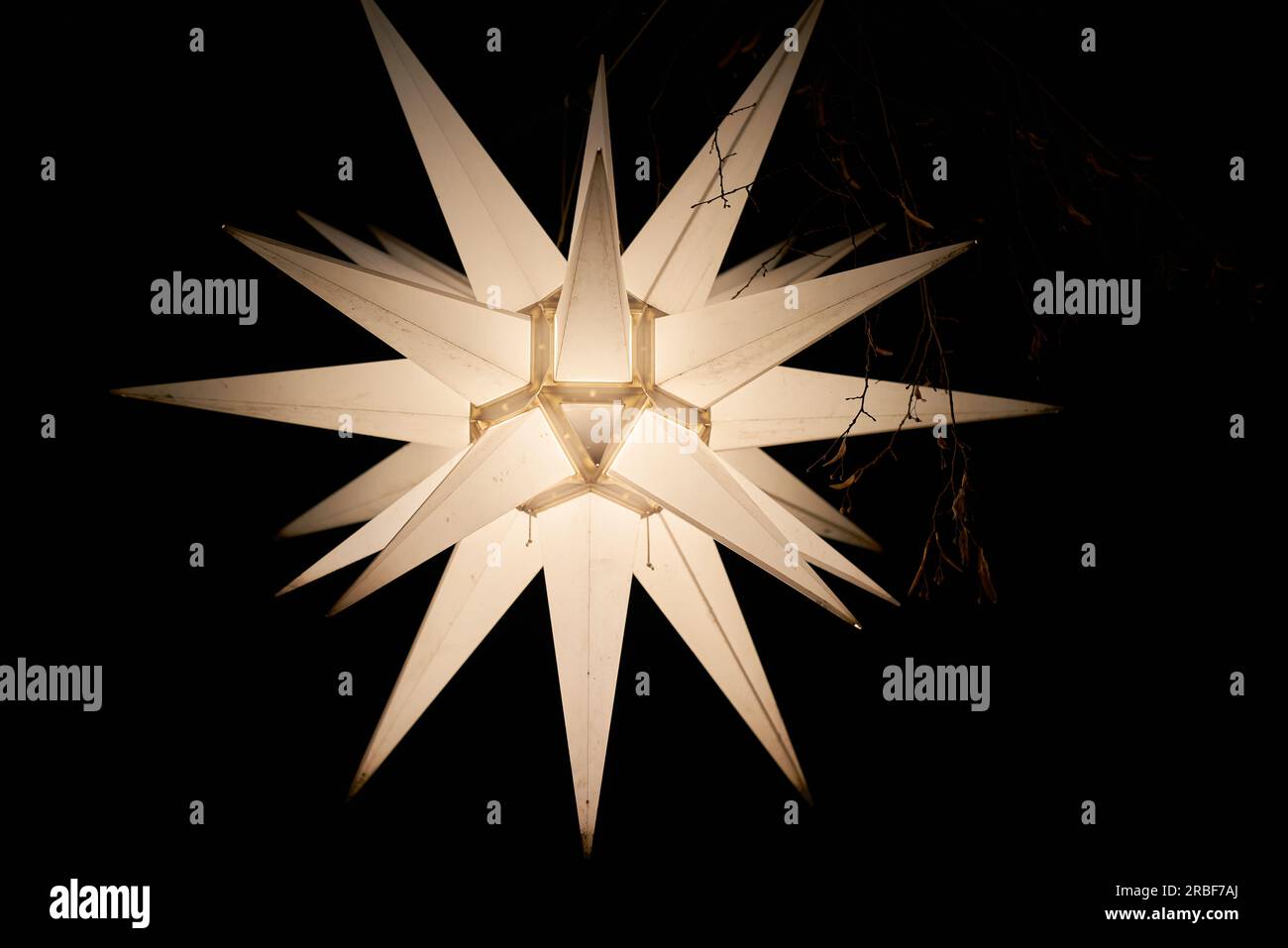 white christmas star as decoration at christmas market in december in ...