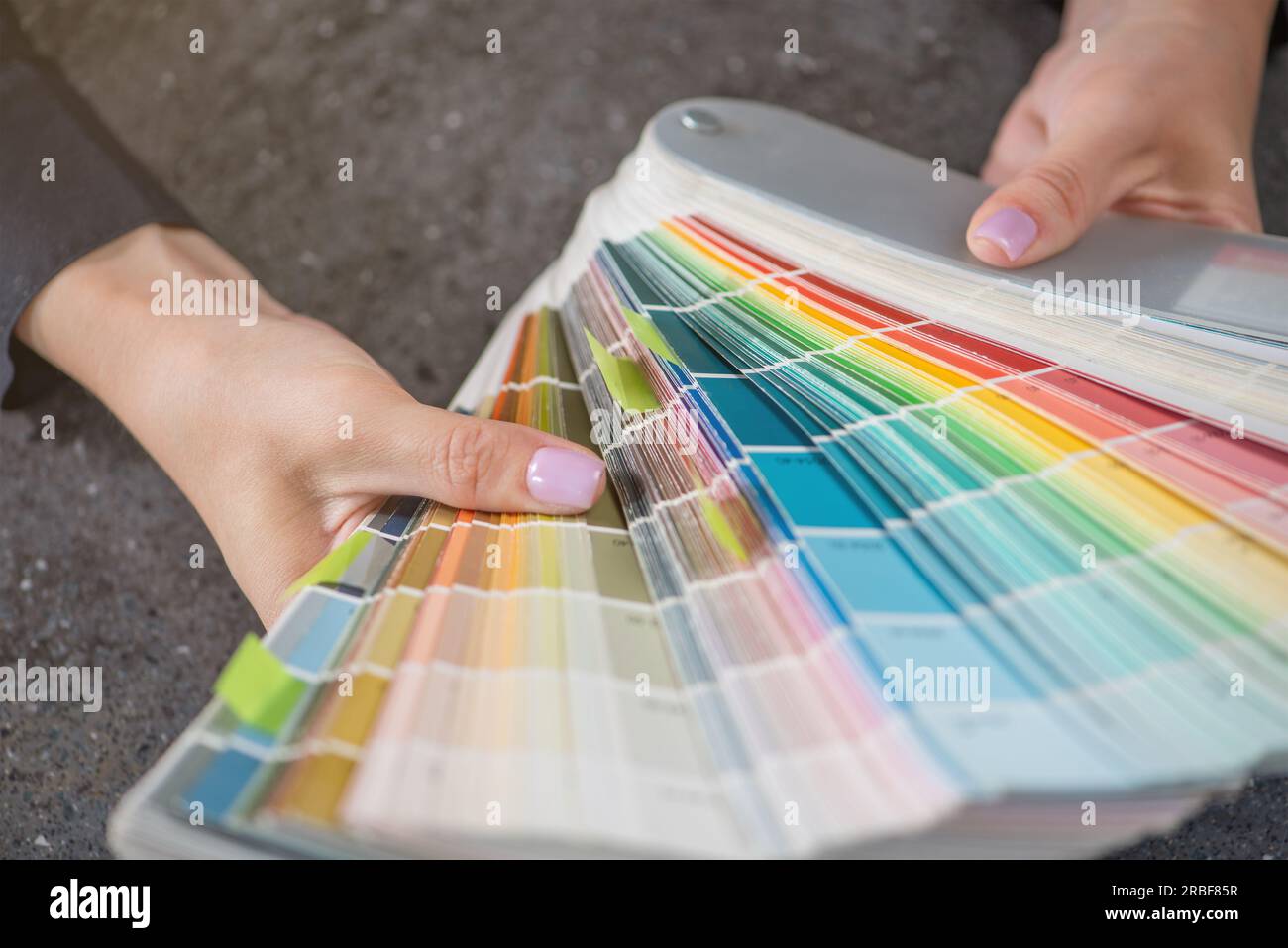 Home repairs. Choice of wall paint colors. The designer selects a color ...