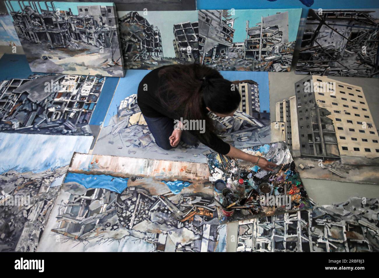 Palestinian artist Maha Al-Dayya has painted artworks of the houses ...