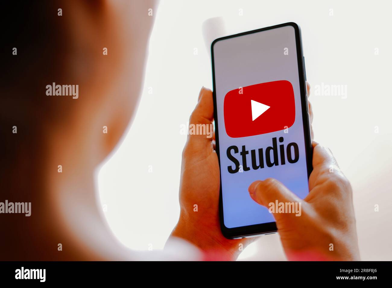 In this photo illustration, the YouTube Studio logo is displayed on a ...