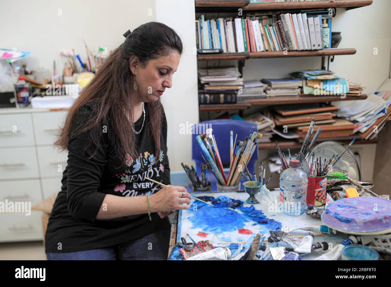 Palestinian artist Maha Al-Dayya has painted artworks of the houses ...