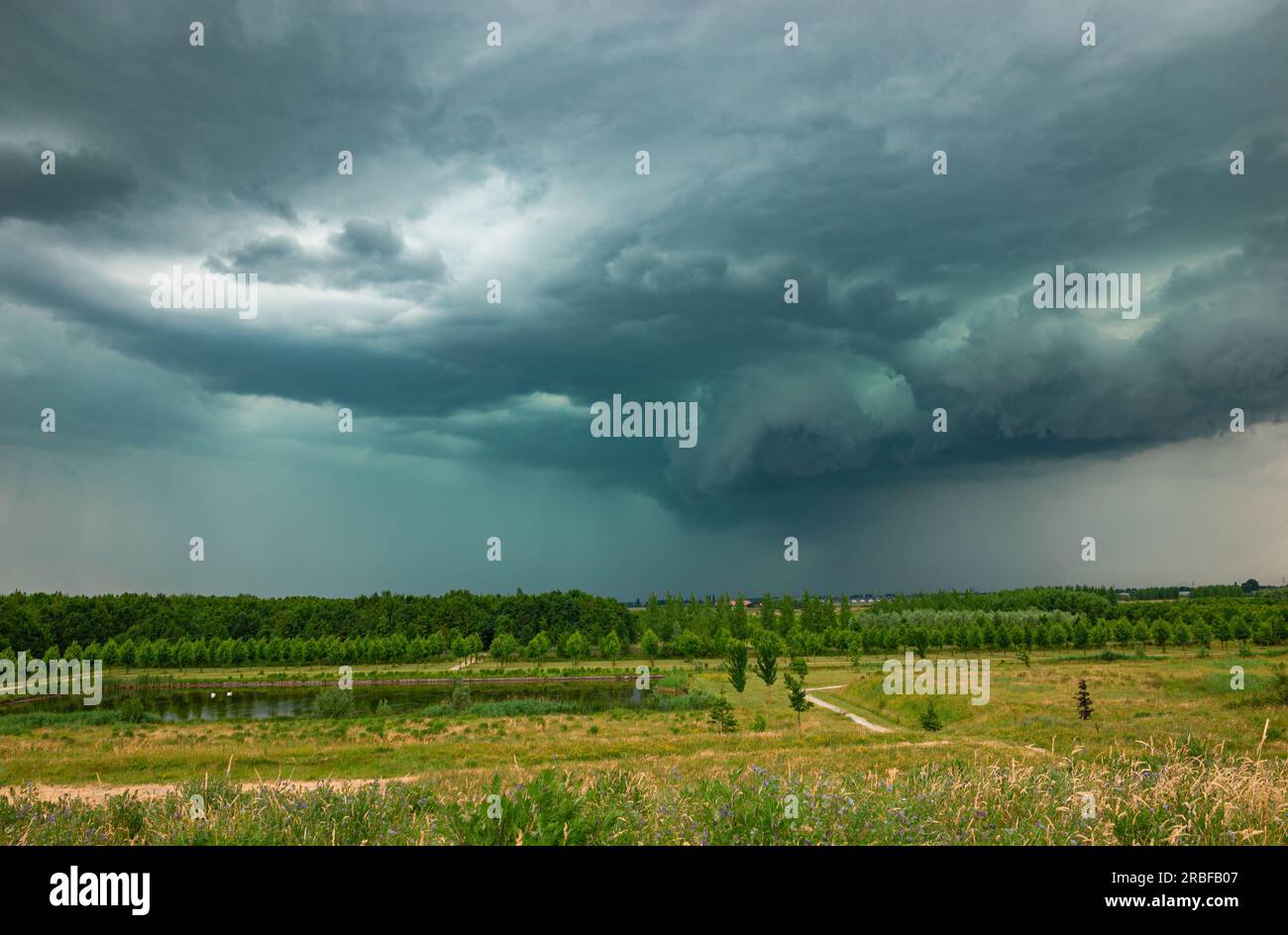 Angry looking sky with green blue colors of an approaching thunderstorm ...
