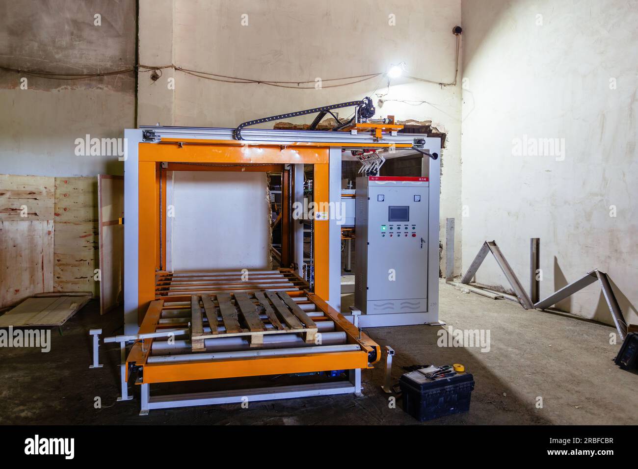 Cement packaging, bagging and stacking machine Stock Photo - Alamy