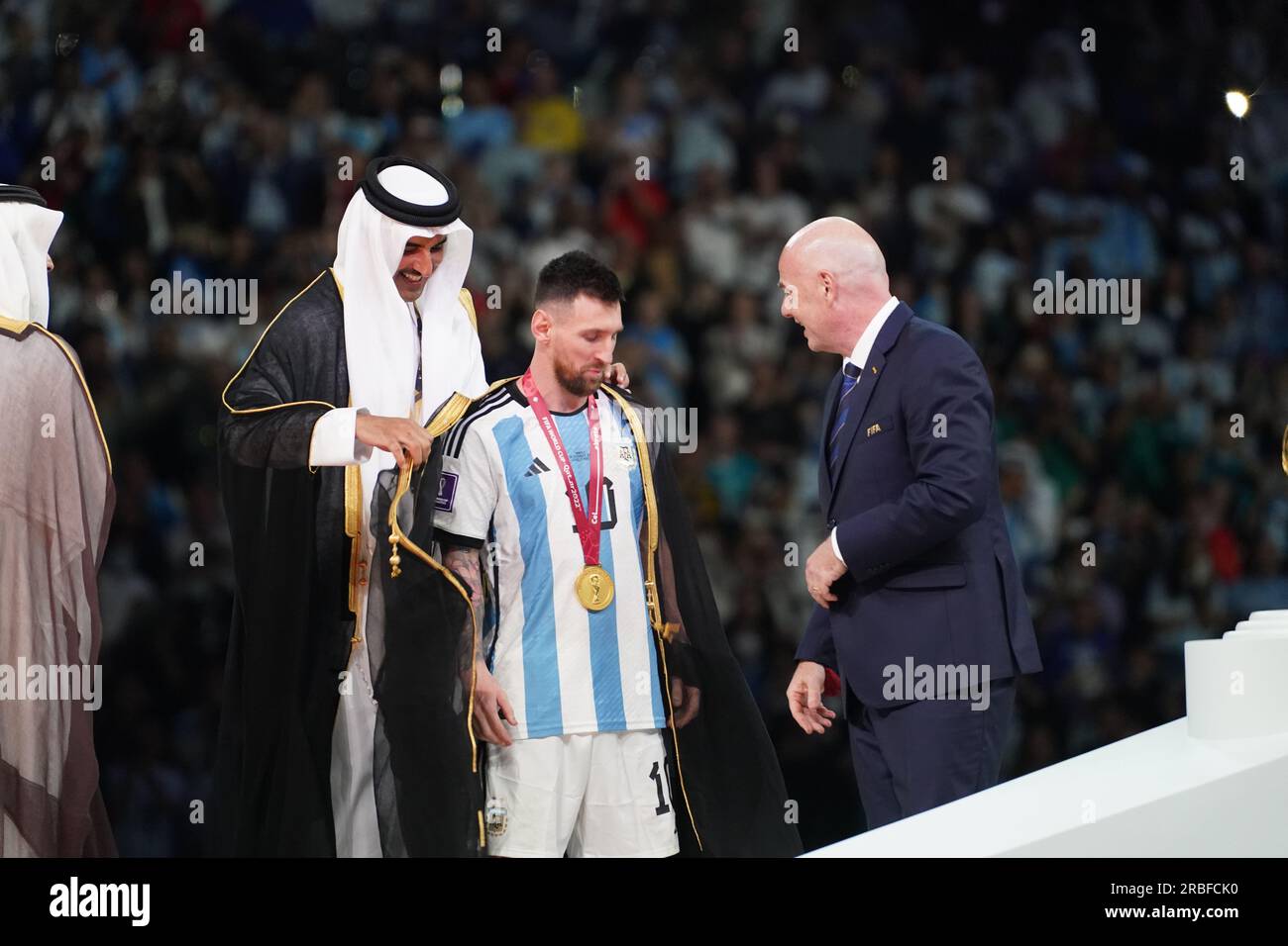 Lusail, Qatar, 18th. December 2022. Lionel Messi recives the Bishit ...