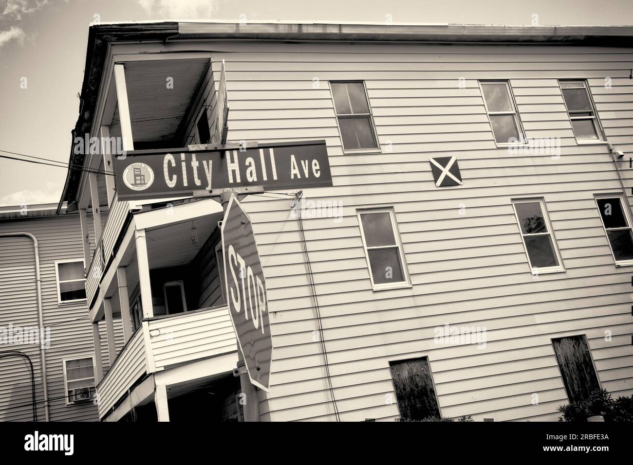 A three decker house condemned sign on it Stock Photo - Alamy