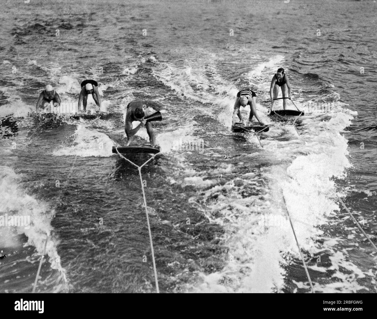 Catalina Island, California: c. 1927. An aquaplane teacher shouts ...